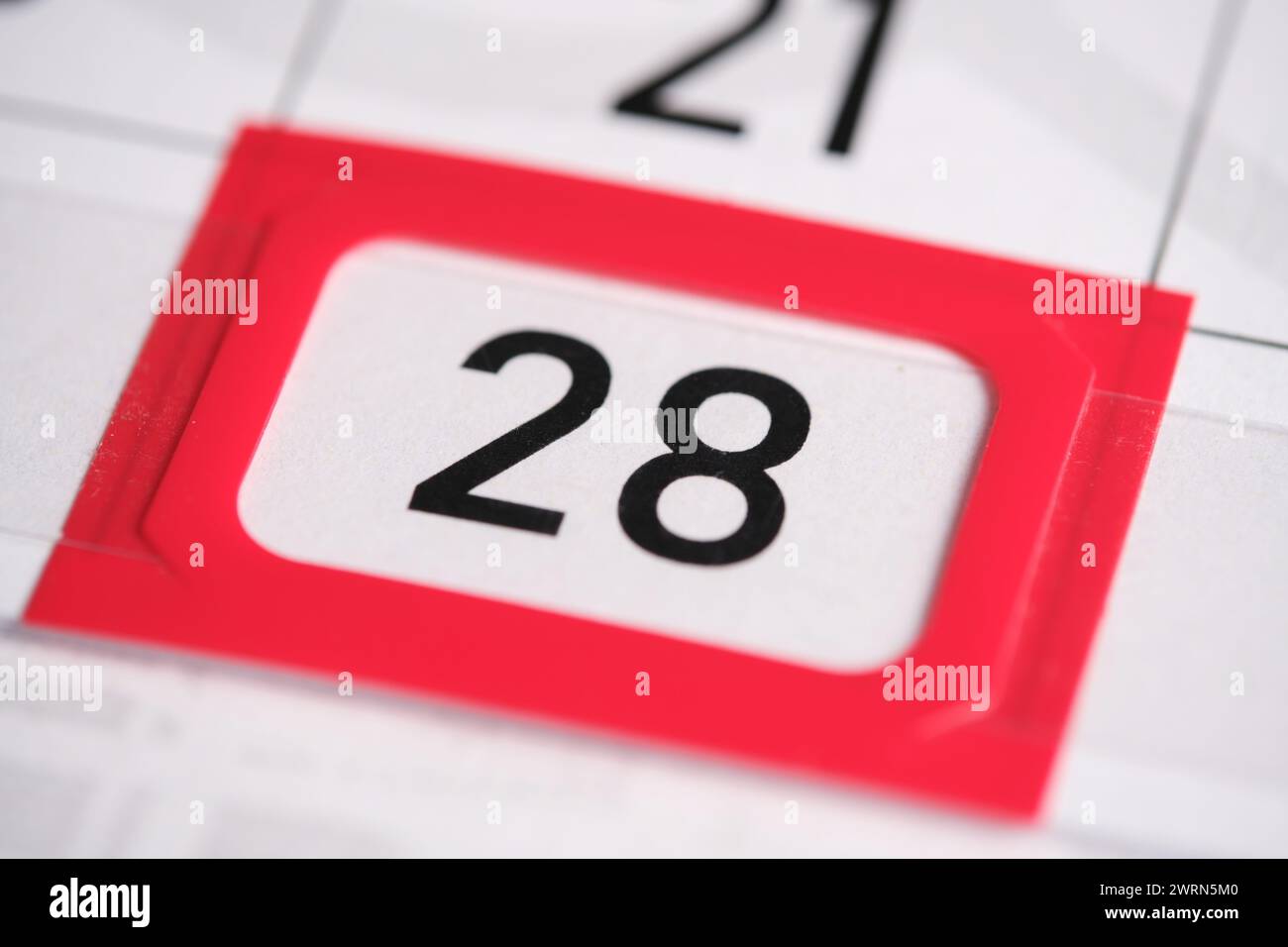 Calendar date. The 28th number the calendar is highlighted in a red ...