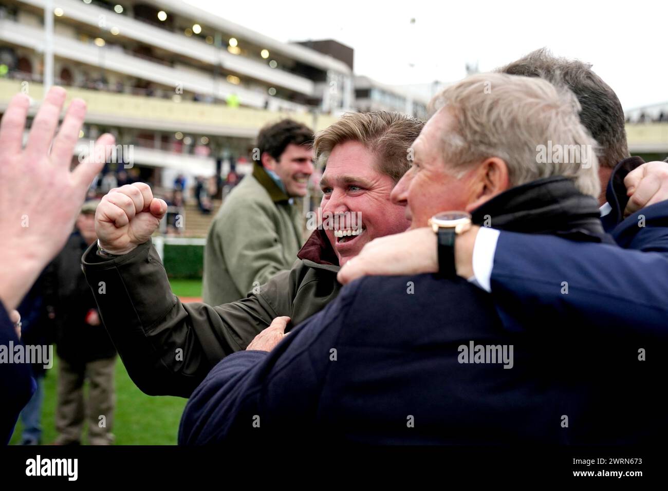 Trainer Dan Skelton (centre) celebrates after Unexpected Party ridden ...