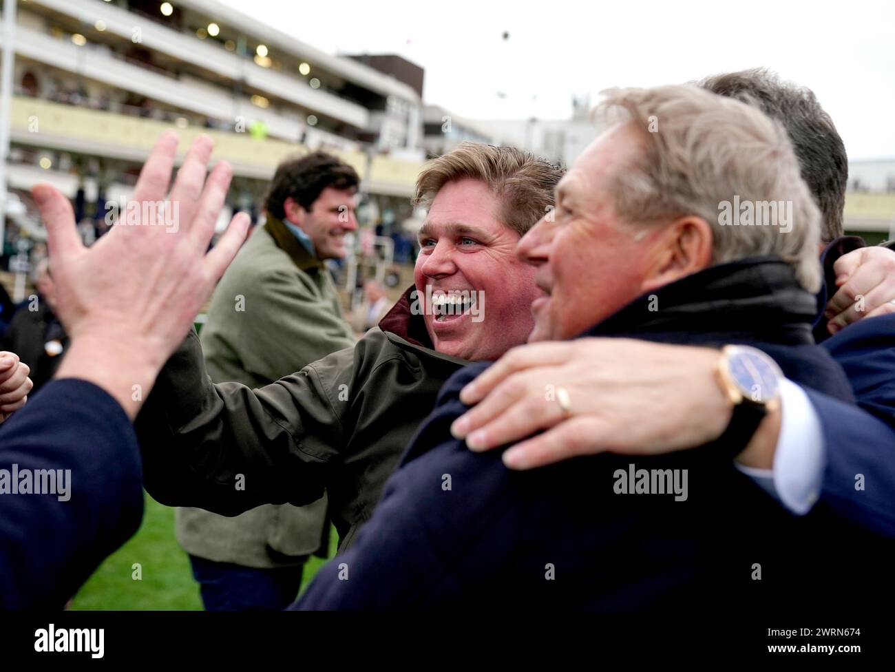 Trainer Dan Skelton (centre) celebrates after Unexpected Party ridden ...