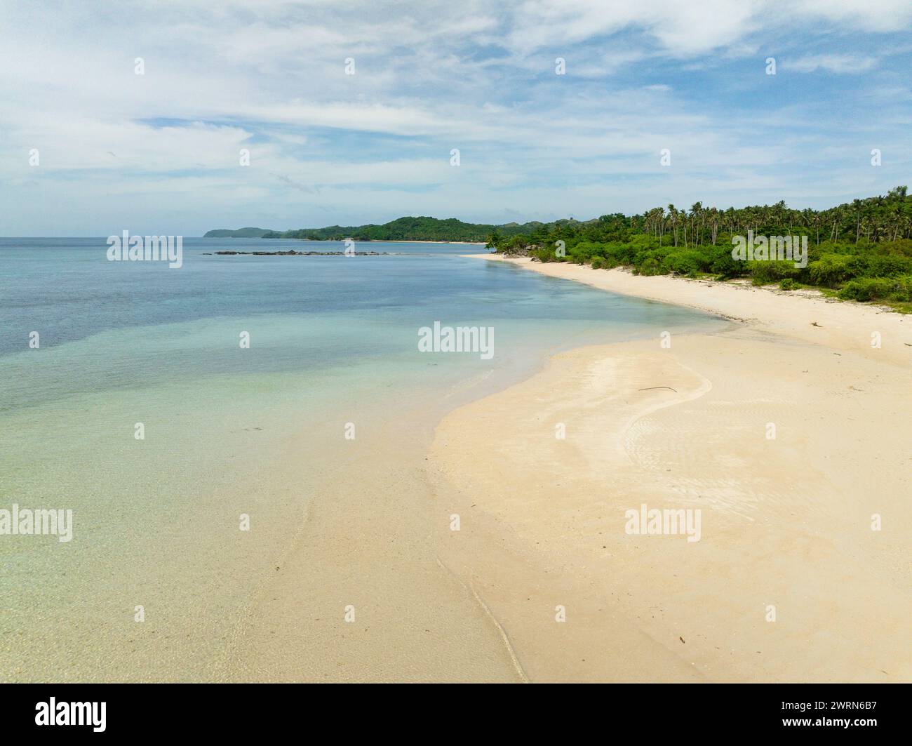 Aerial view of clear water on sandy beach in Santa Fe, Tablas, Romblon ...