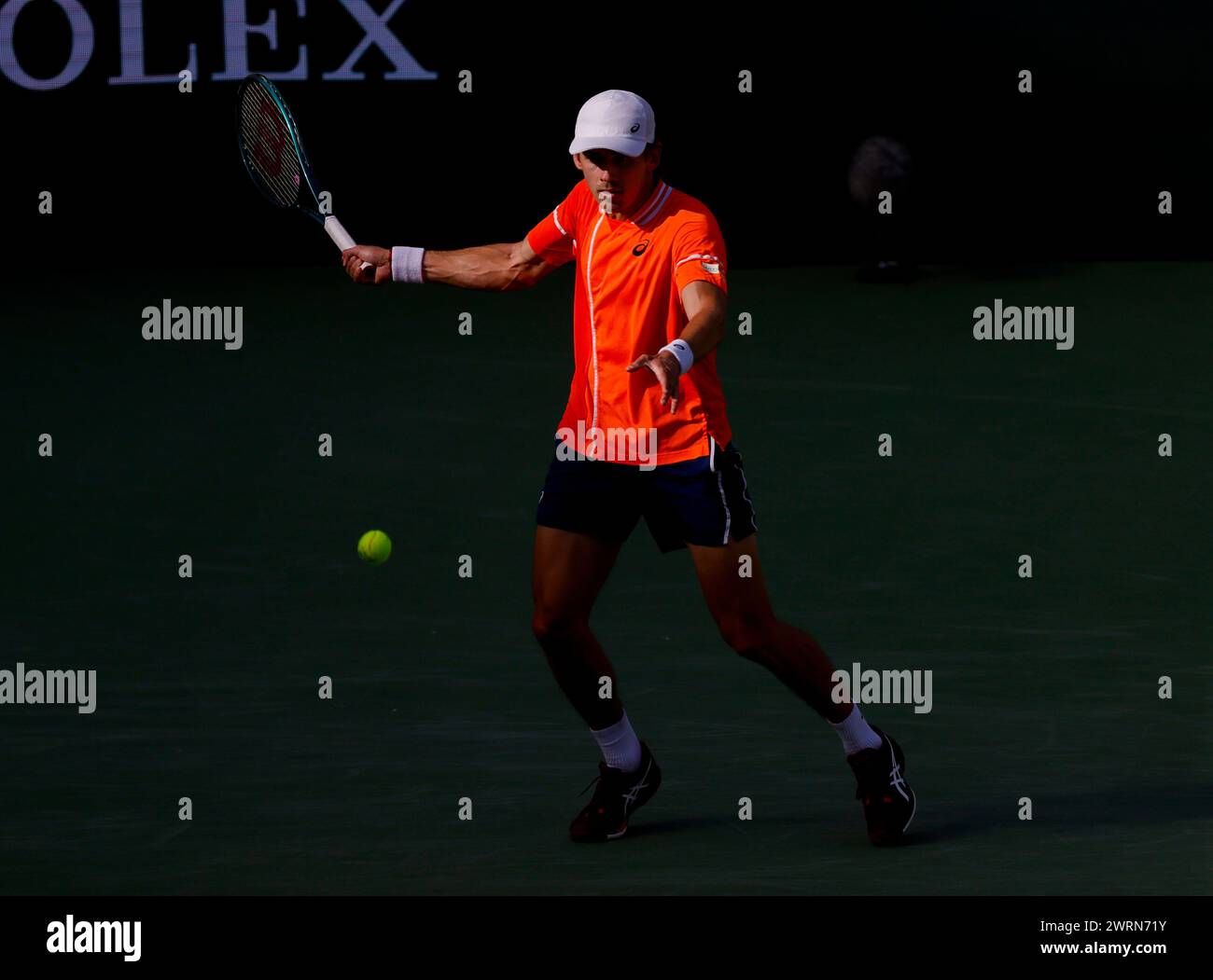 March 12, 2024 Alex De Minaur of Australia returns a shot against ...
