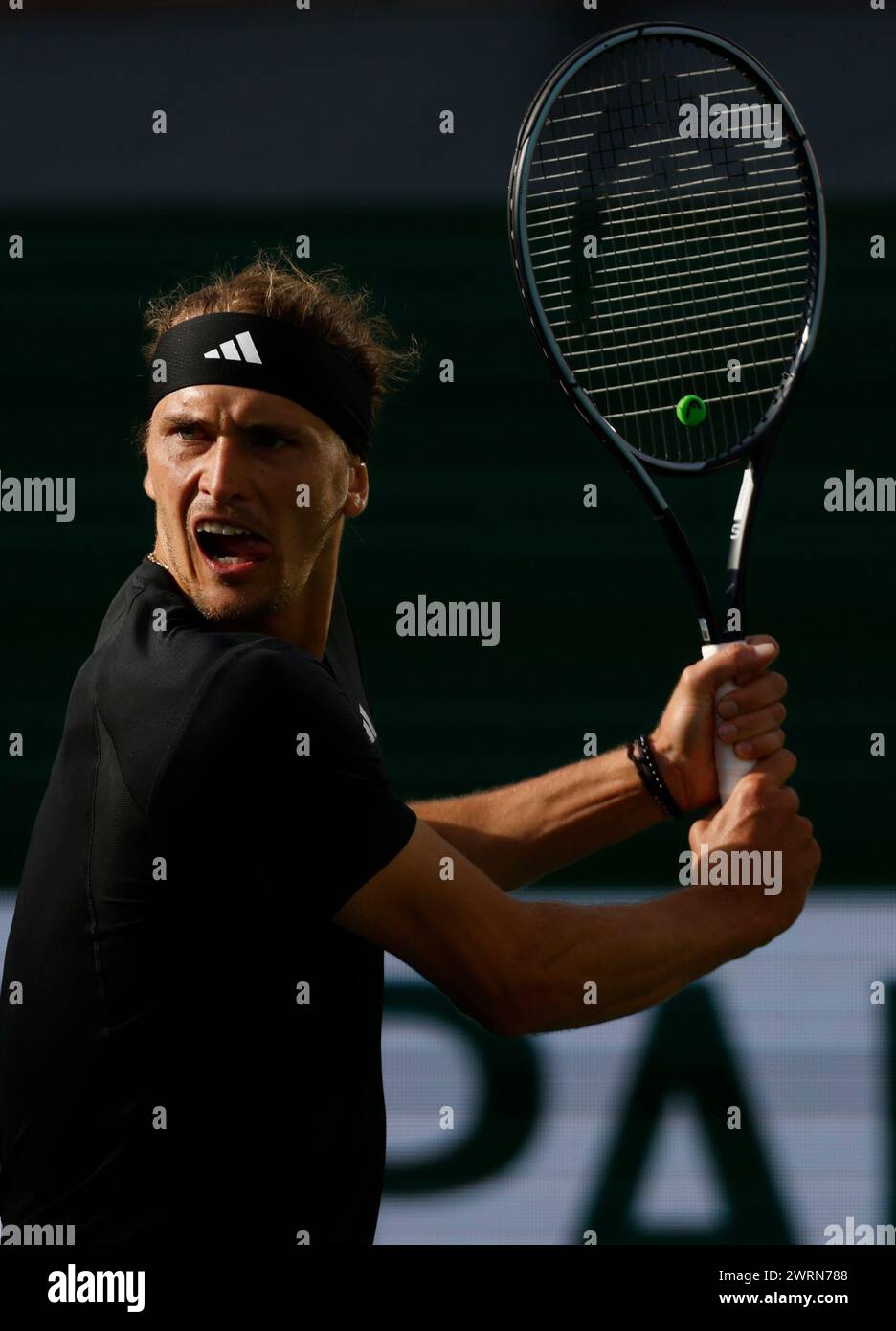 March 12, 2024 Alexander Zverev of Germany returns a shot against Alex ...