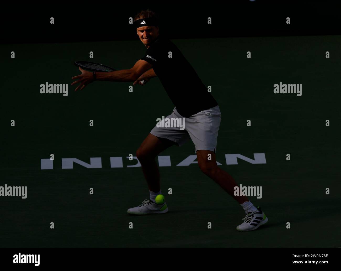 March 12, 2024 Alexander Zverev of Germany returns a shot against Alex ...