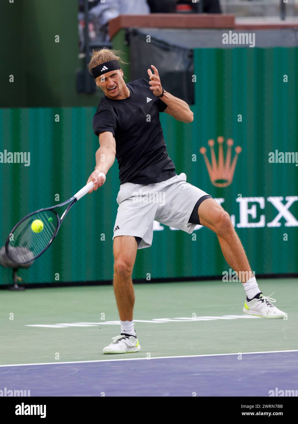 March 12, 2024 Alexander Zverev of Germany returns a shot against Alex ...
