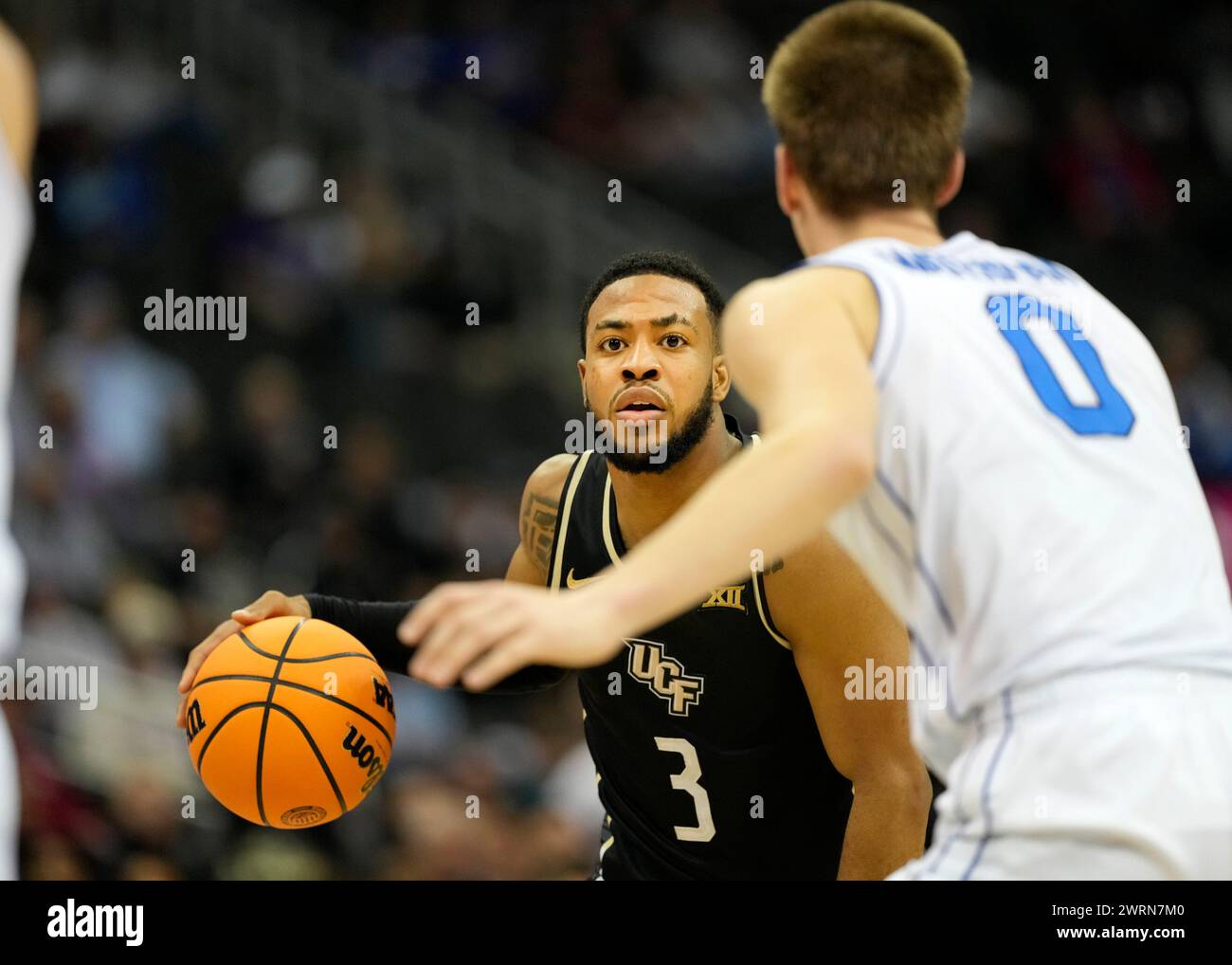 MAR 13 2024: UCF Knights guard Darius Johnson (3) prepares to drive ...