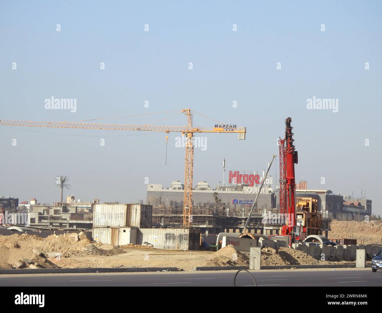 Cairo, Egypt, March 2 2024: A crane tower of Hassan Allam Co, A construction site of new high ...