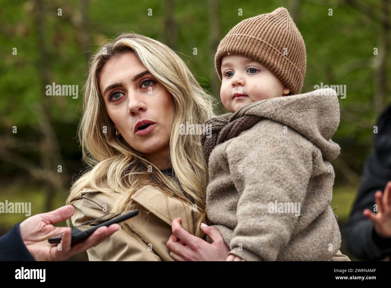 Kruisem, Belgium. 13th Mar, 2024. Merlier's partner Cameron ...