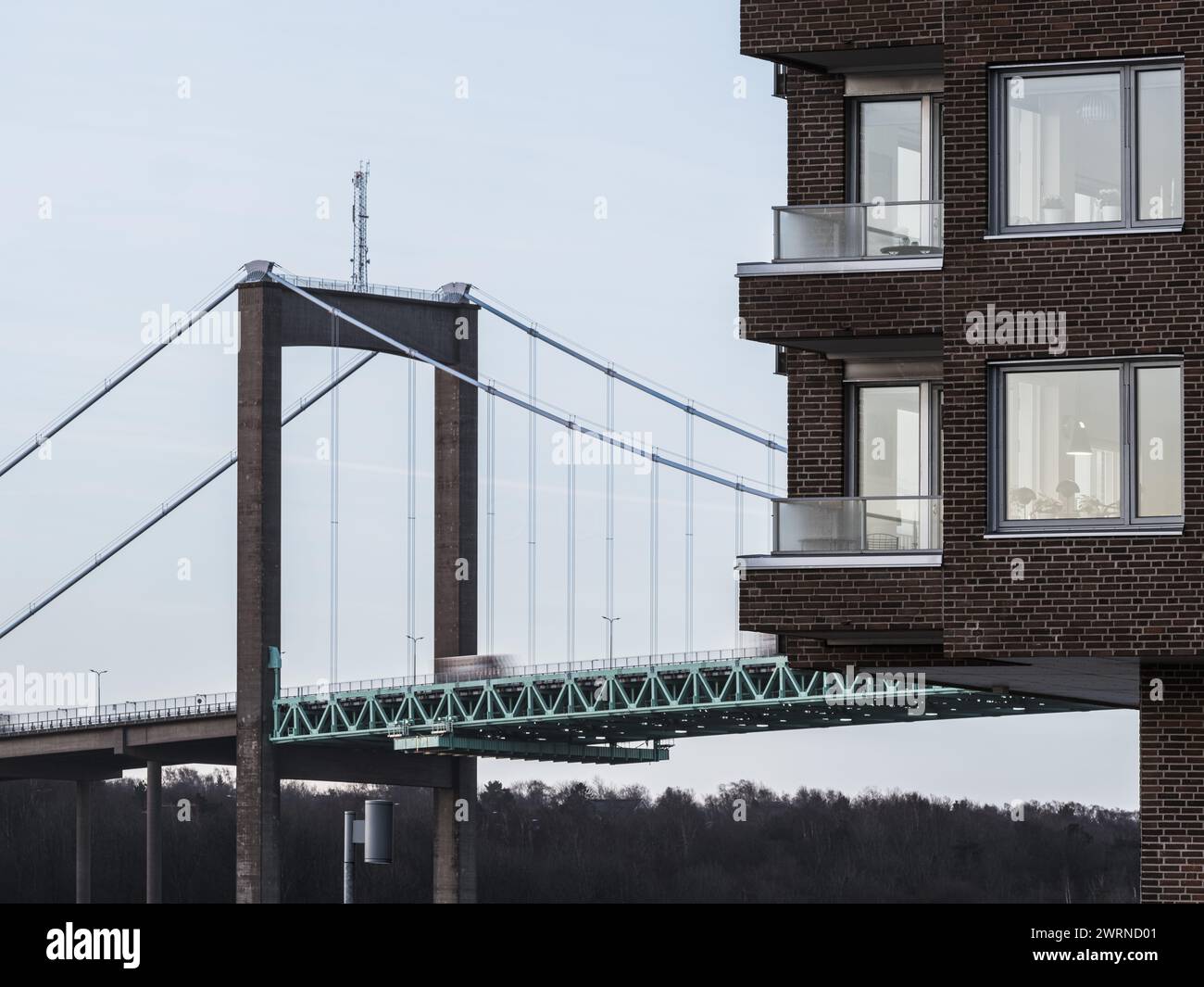 The side of a residential brick building with its modern balconies ...