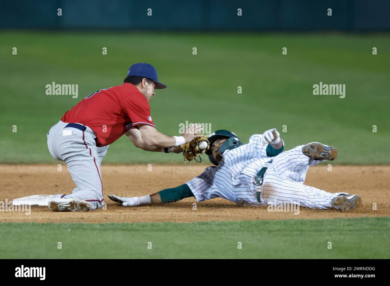 Sacramento St. base runner Jacob Cortez (4) is tagged out at second ...