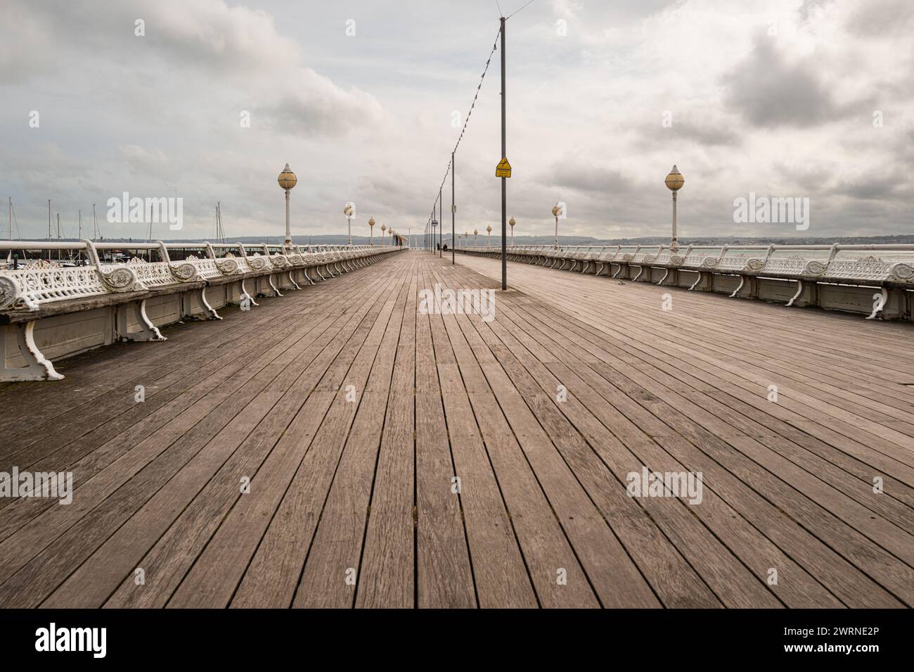 Torquay Princess Pier boardwalk on a cloudy day in early spring. Devon ...