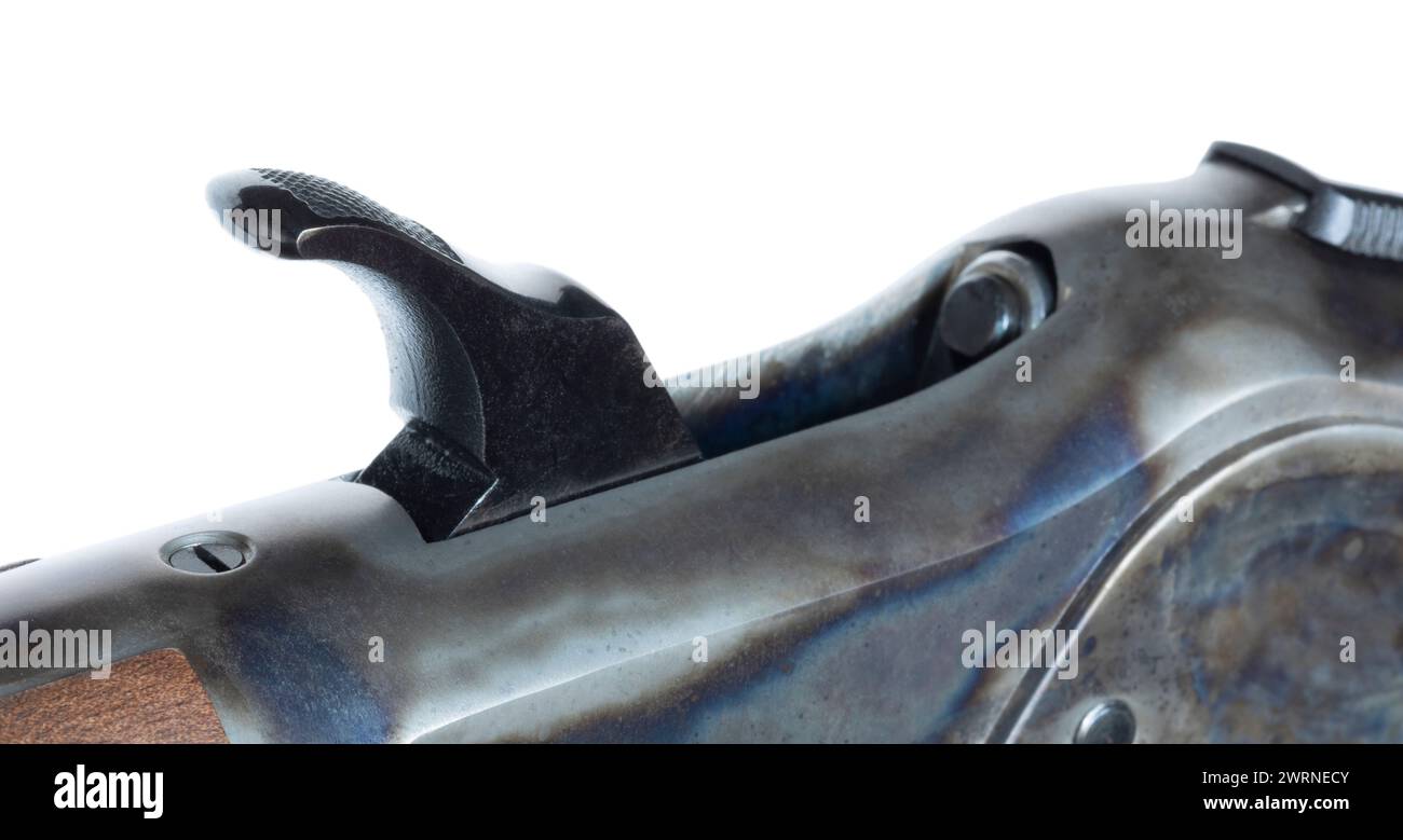 Hammer on a lever action rifle that is color casehardened in the ready ...