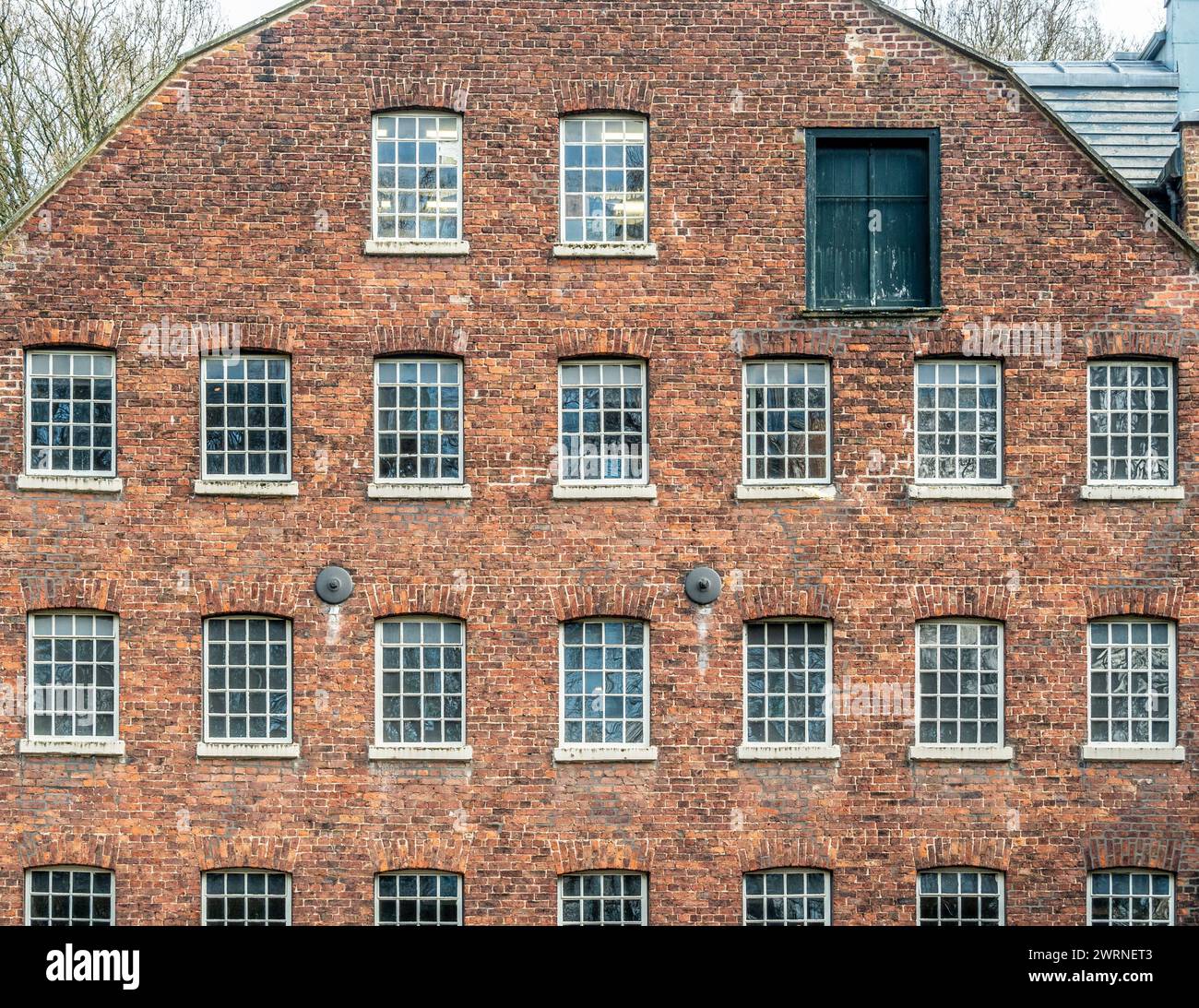 Exterior facade of Quarry Bank Mill in Styal, Cheshire, UK Stock Photo ...