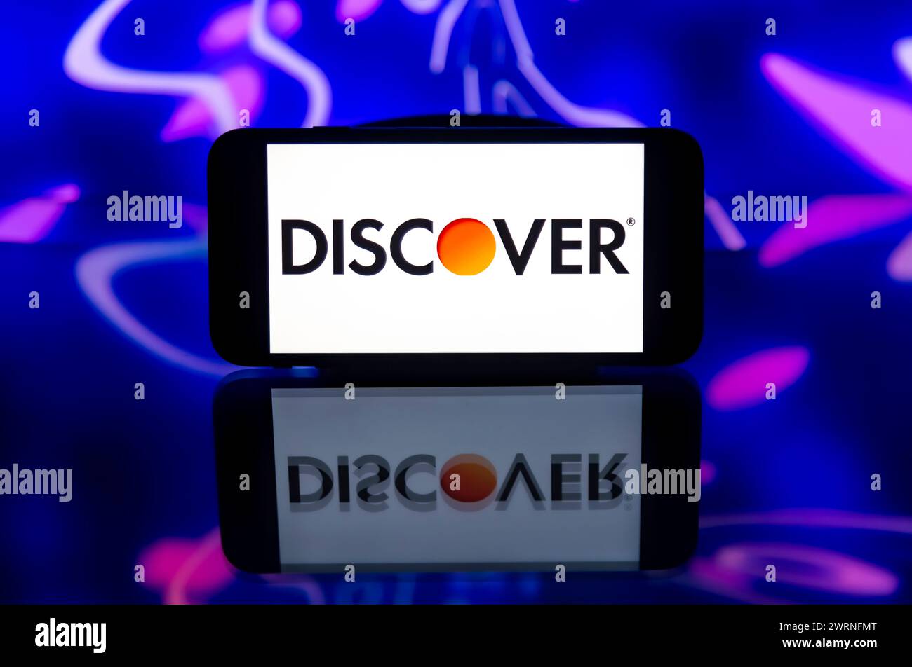 In this photo illustration, the Discover logo is seen displayed on a ...