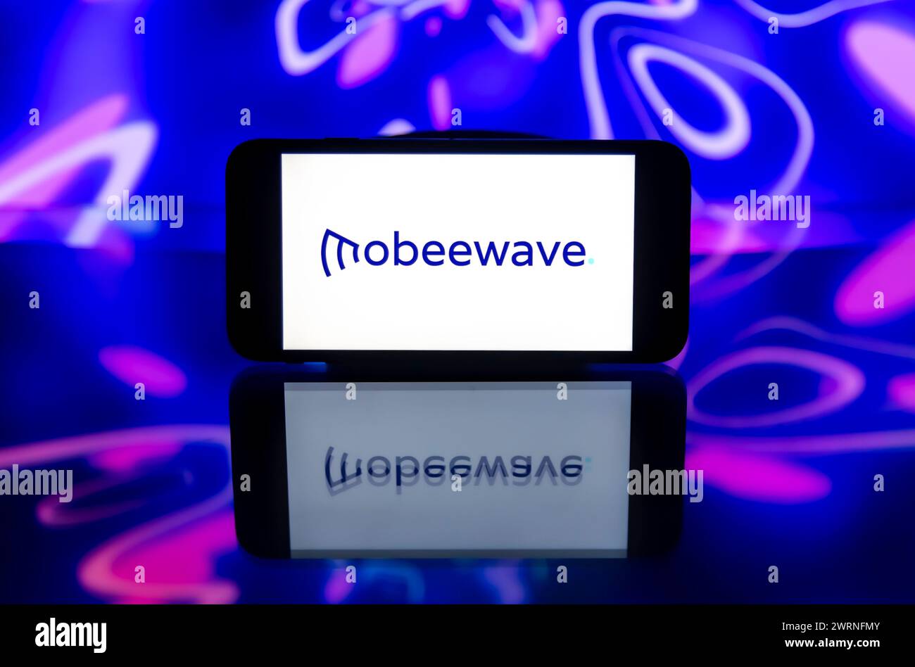 In this photo illustration, the Mobeewave logo is seen displayed on a ...
