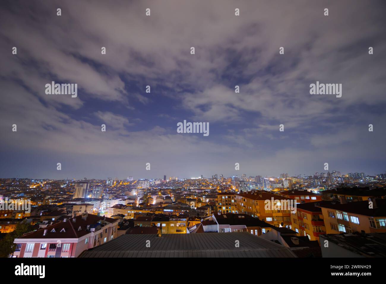 View of clouds over living apartment building in Turkey at night Stock ...