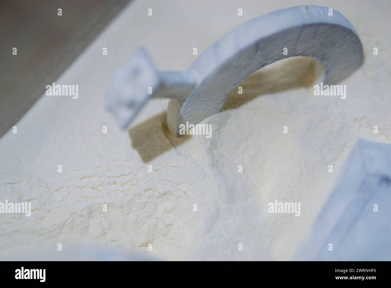 Objects printed on a 3D printer from powdered polyamide lying in white ...