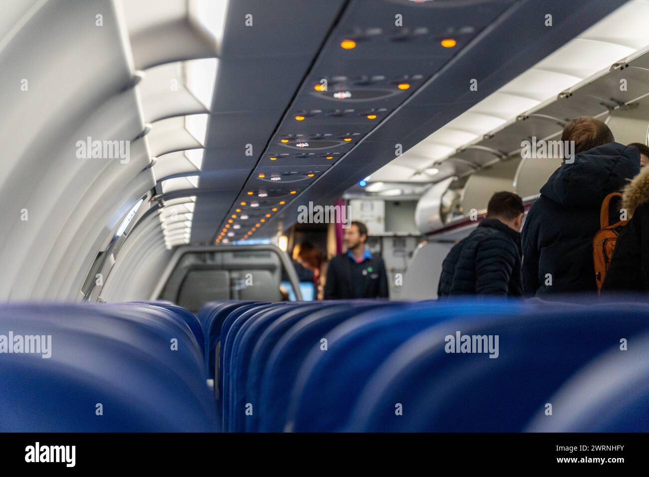 Bavaria, Germany - March 1, 2024: Row of seats in a passenger airplane ...