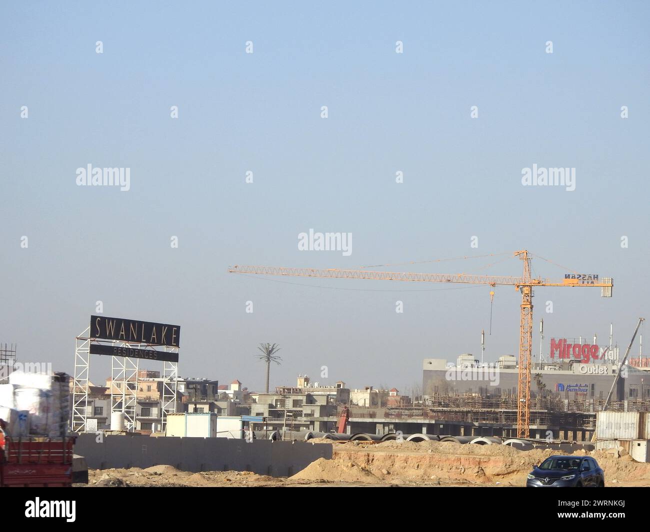 Cairo, Egypt, March 2 2024: A crane tower of Hassan Allam Co, A construction site of new high ...