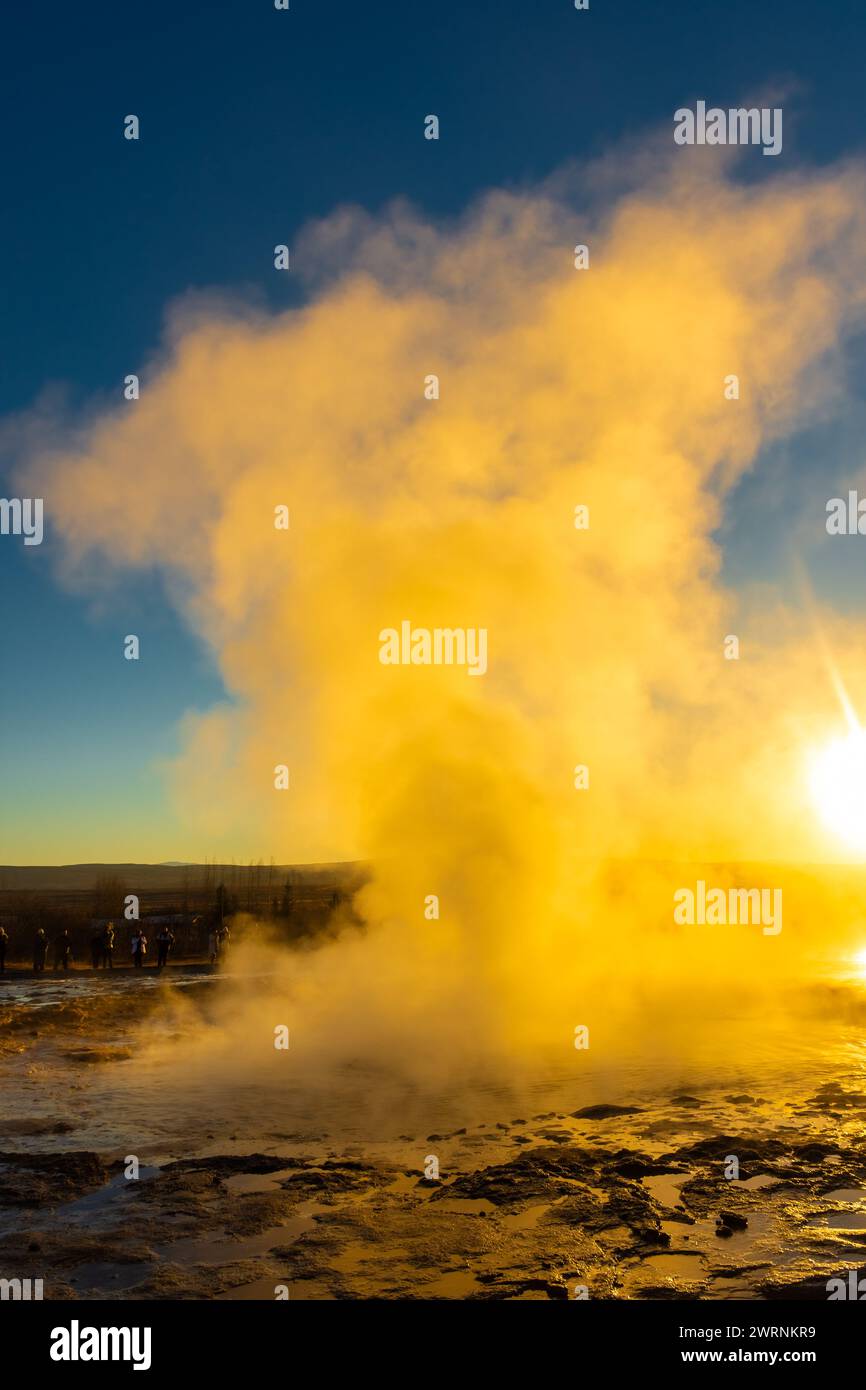 Stokkur geyser spectacular eruption in front of the sun, Iceland Stock ...