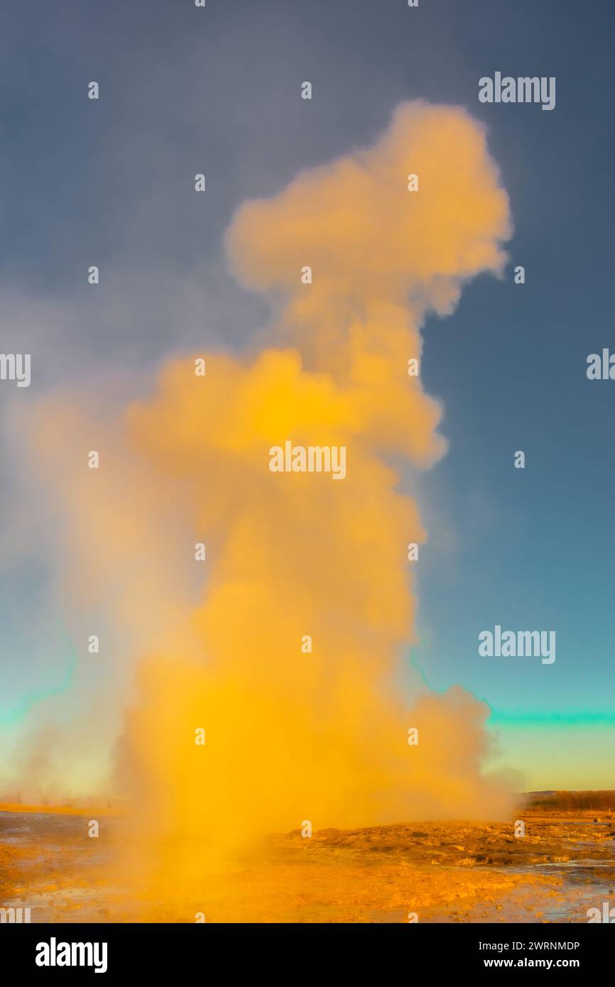 Stokkur geyser spectacular eruption in front of the sun, Iceland Stock ...