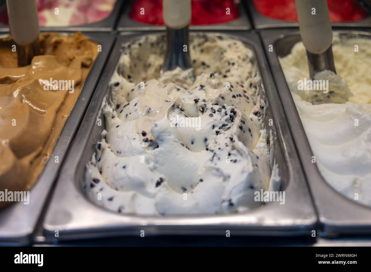 Assortment of fresh made Italian artisanal ice creams in refrigerator ...