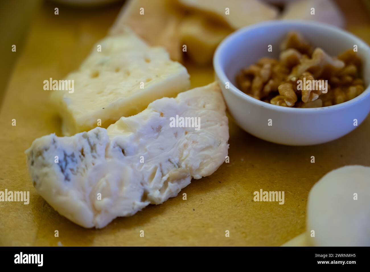 Cheese tasting, piece of italian blue cheeses gorgonzola dolce and ...