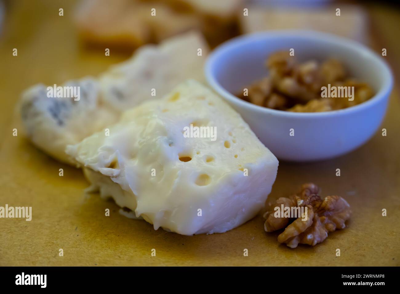 Cheese tasting, piece of italian blue cheeses gorgonzola dolce and ...