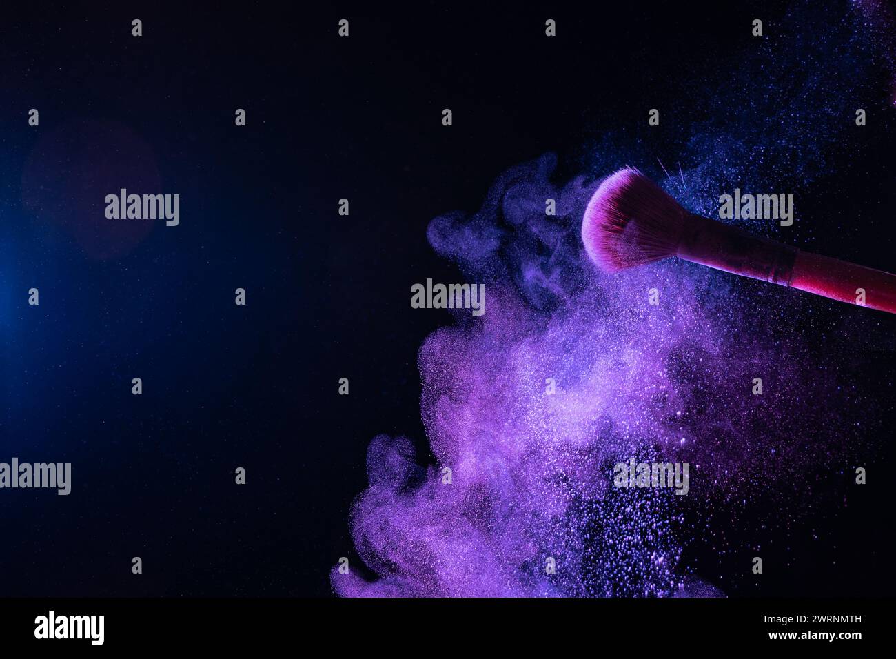 pink makeup powder dropping from a brush in air Stock Photo - Alamy