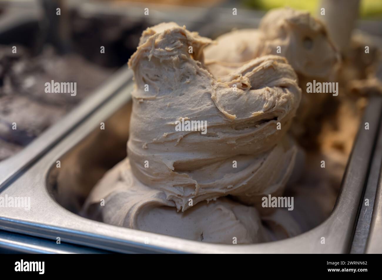 Assortment of fresh made Italian artisanal ice creams in refrigerator ...