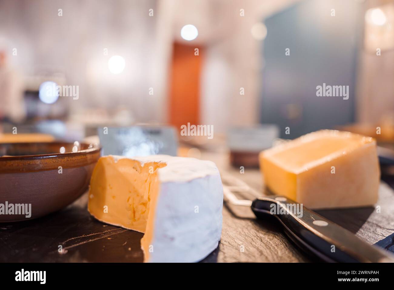 Indulge in a Luxury Cheese Selection on a Wooden Table at Engelberg ...