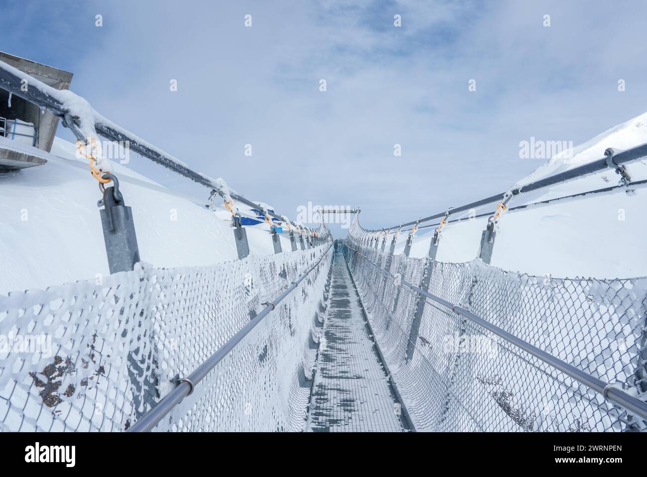 Suspension Bridge in Snow, Engelberg Ski Haven, Switzerland Stock Photo ...