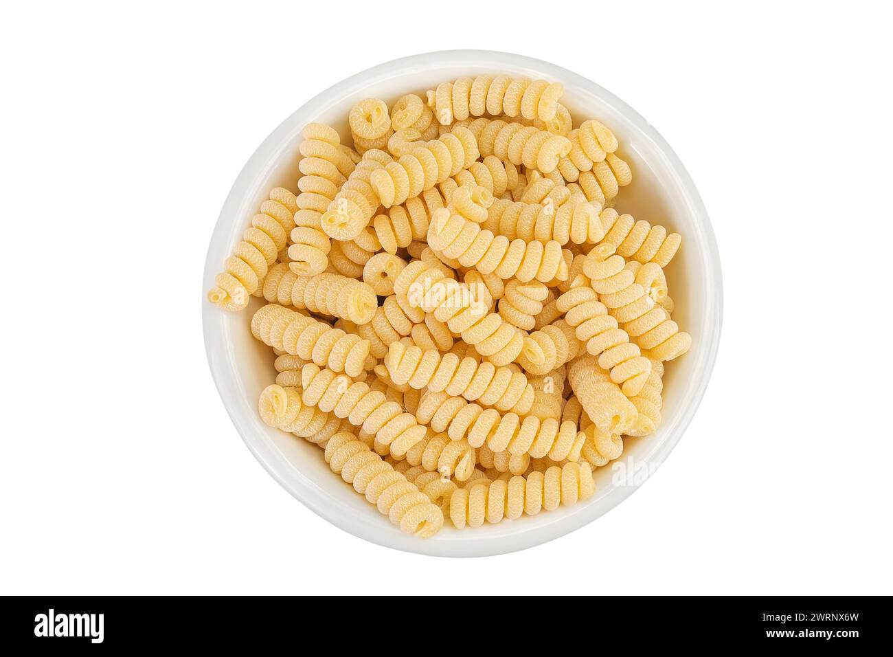 Italian spiral shaped pasta, Fusilli bucati macaroni in ceramic bowl ...