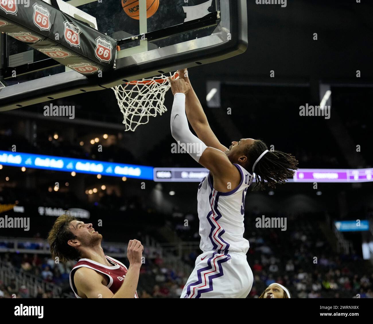MAR 13 2024: TCU Horned Frogs forward Chuck O'Bannon Jr. (5) tries a ...