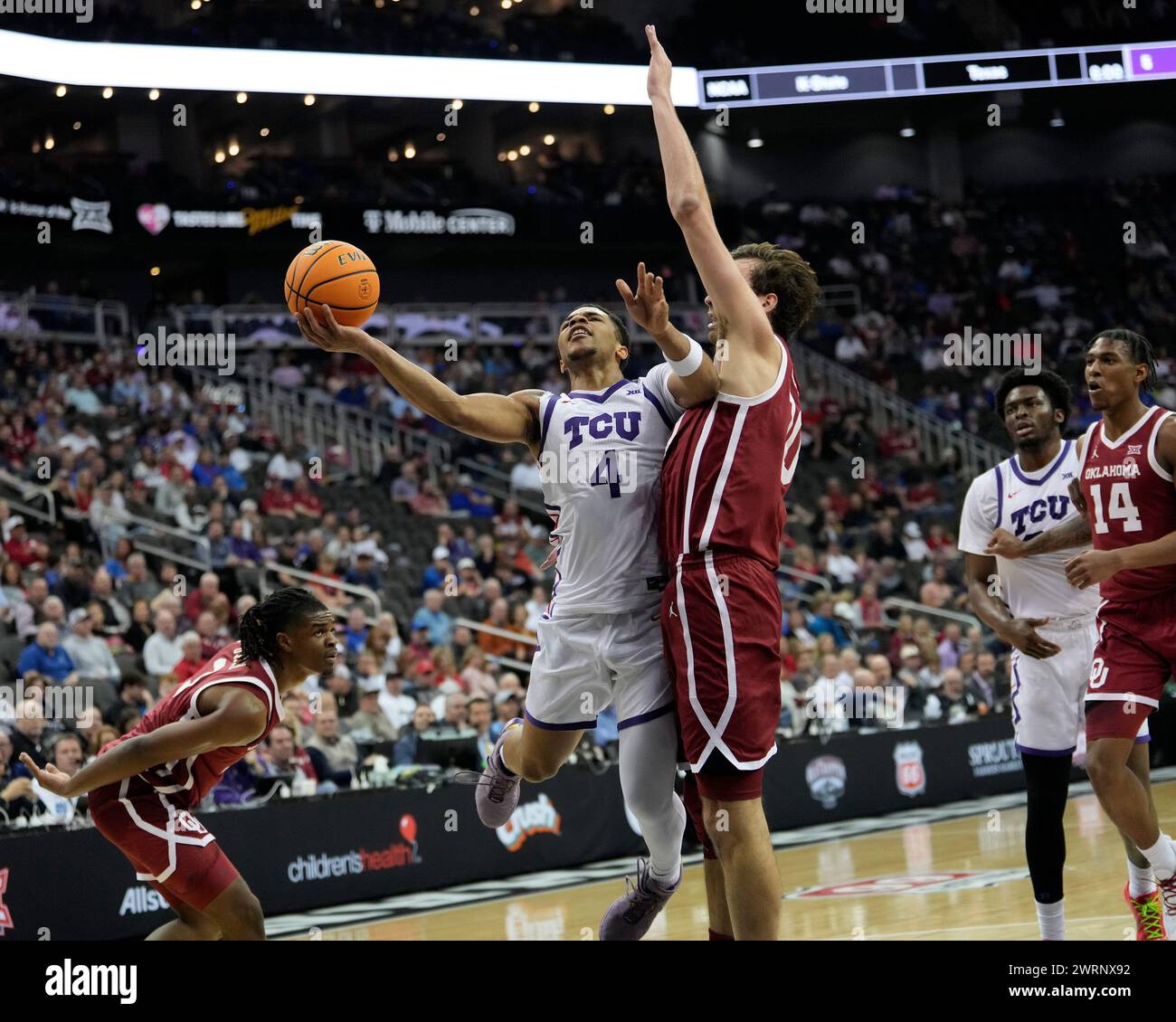MAR 13 2024: TCU Horned Frogs guard Jameer Nelson Jr. (4) puts the ball ...