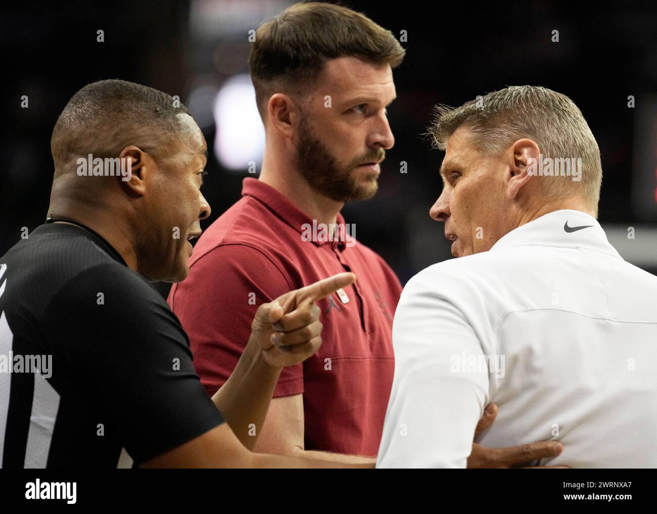 MAR 13 2024: OU coach Porter Moser has a pointed discussion with an ...