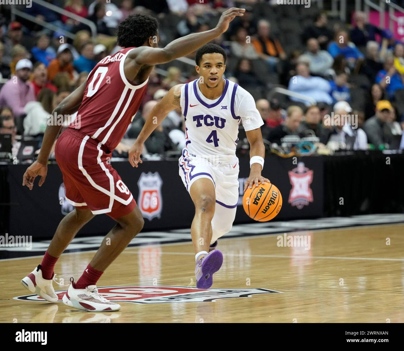 MAR 13 2024: TCU Horned Frogs guard Jameer Nelson Jr. (4) drives the ...