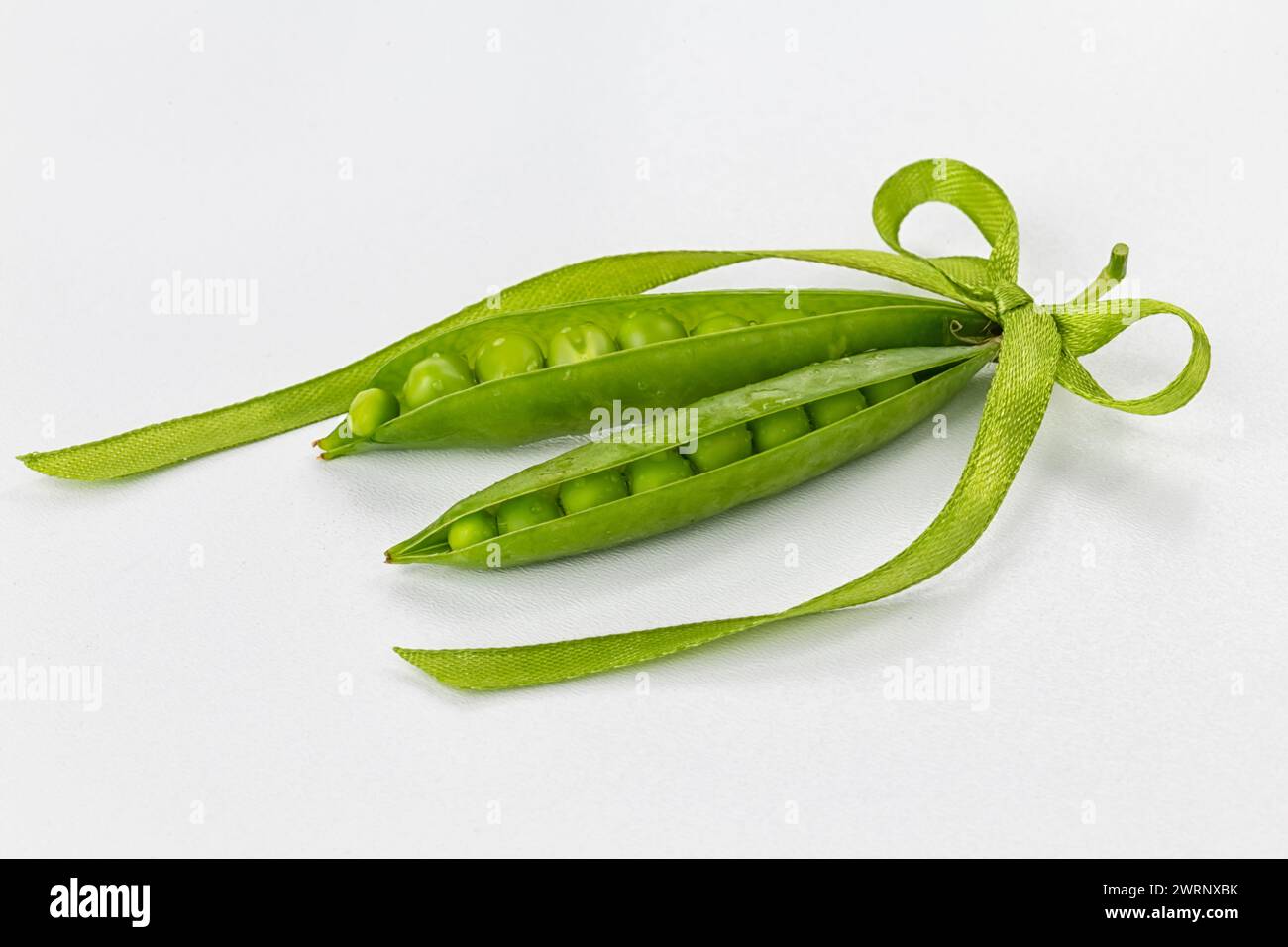 Peas, isolated peas in pods on a white background Stock Photo - Alamy