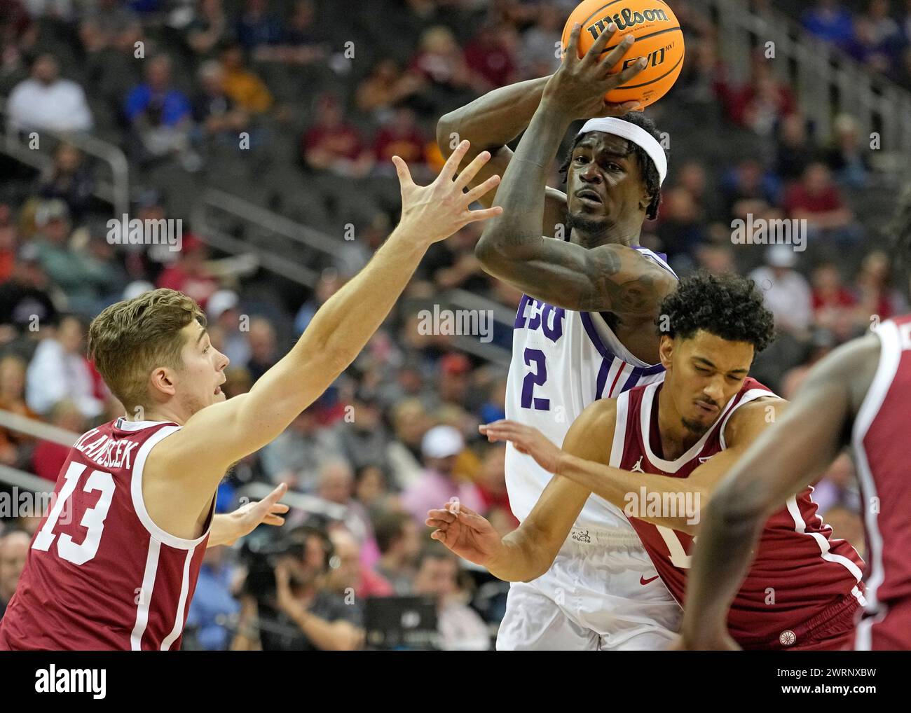 MAR 13 2024: TCU Horned Frogs forward Emanuel Miller (2) looks for ...