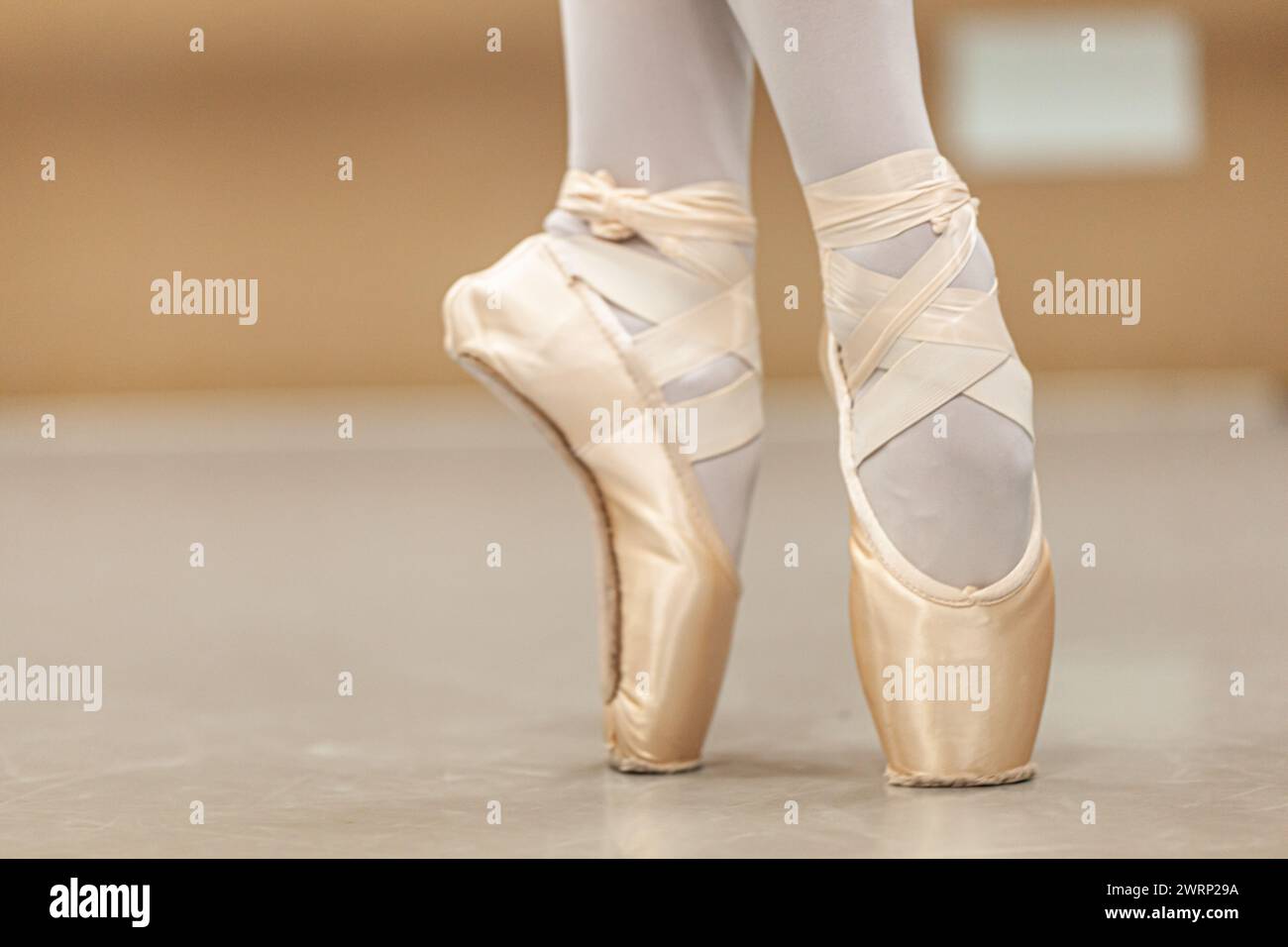 Girl standing on tip toes hi-res stock photography and images - Alamy