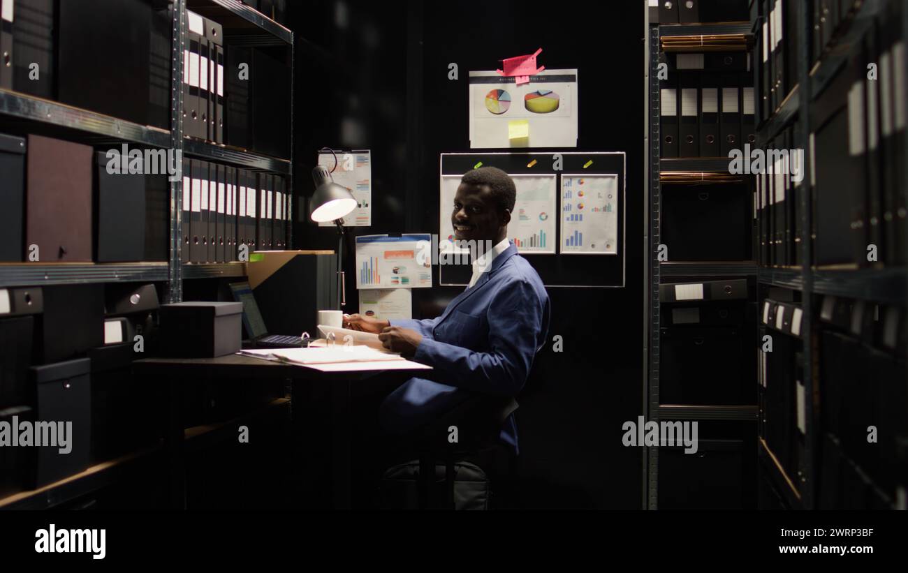 Inspector analyzes evidence in room hi-res stock photography and images ...