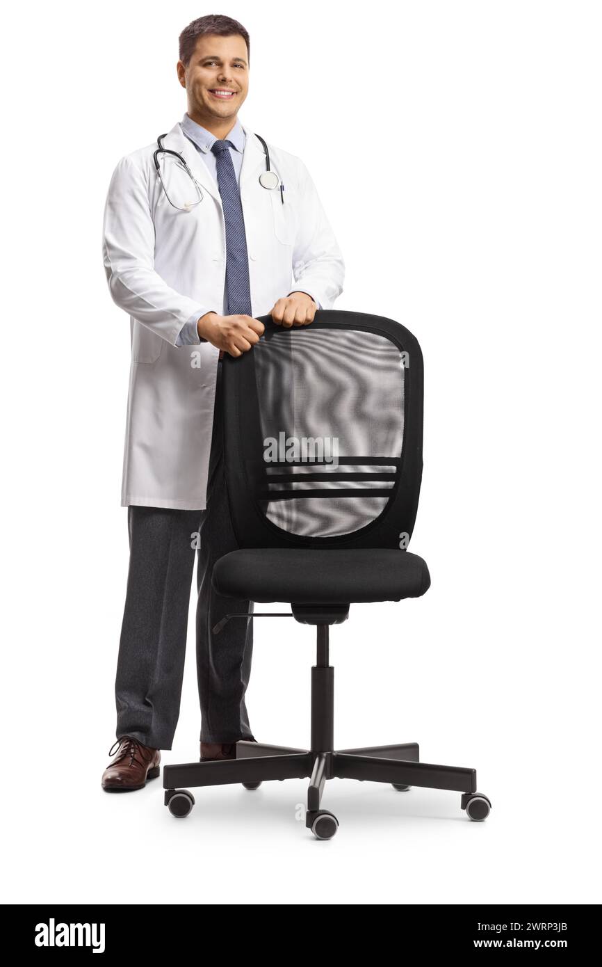 Male doctor standing behind an office chair and smiling isolated on ...