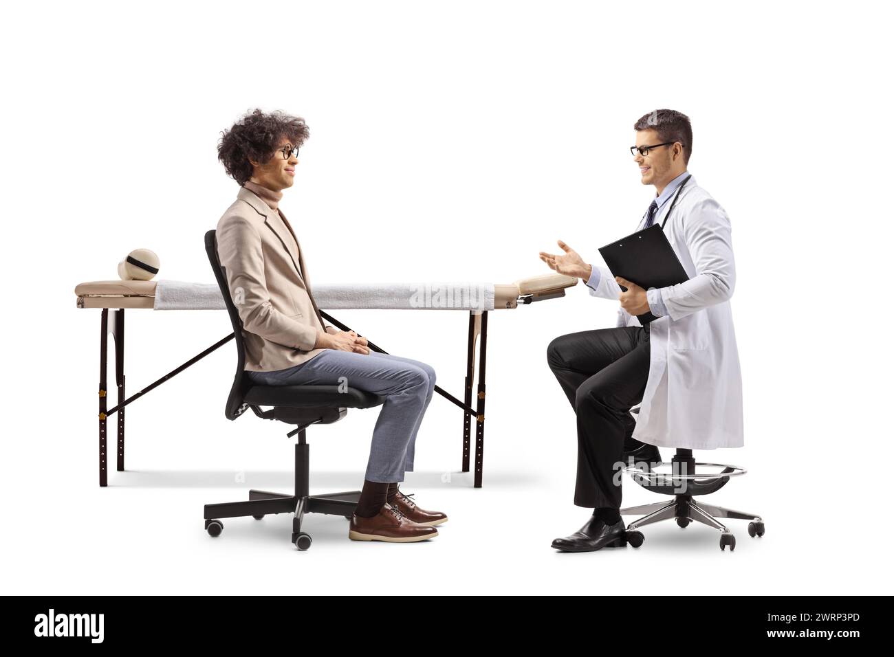 Doctor sitting on chair hi-res stock photography and images - Alamy