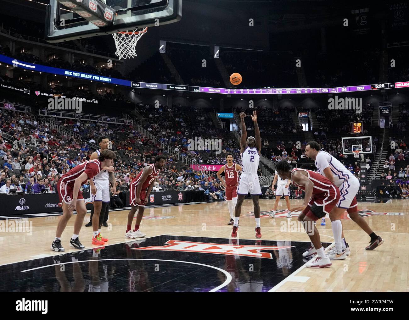 MAR 13 2024: TCU Horned Frogs forward Emanuel Miller (2) puts up a free ...