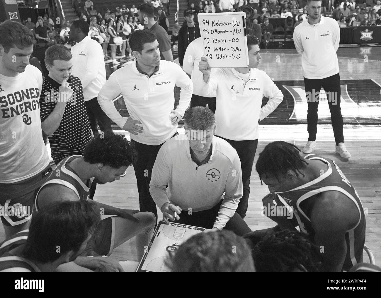 MAR 13 2024: OU coach Porter Moser draws up a play in the pre game ...