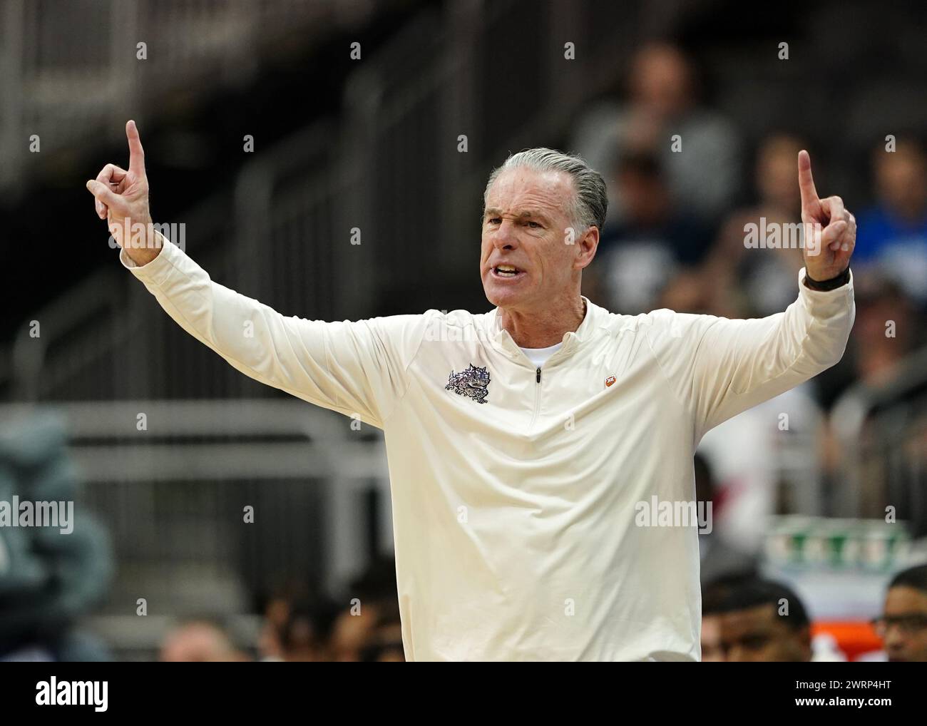 MAR 13 2024: TCU coach Jamie Dixon calls a play against OU in the Big ...