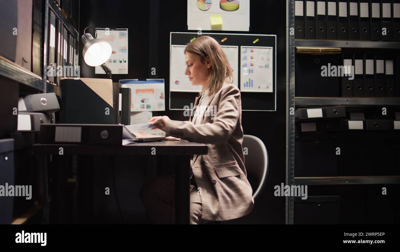 In office, police officer arrives and searches through criminal history ...