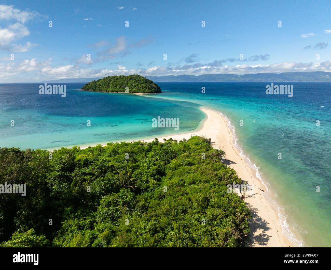 Tropical Island with sandbar and white beach with turquoise sea water ...