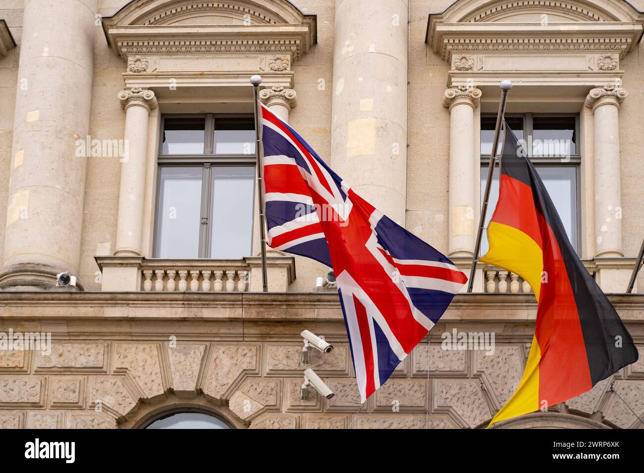 colored national flag Germany, Great Britain on beautiful silk fabric ...