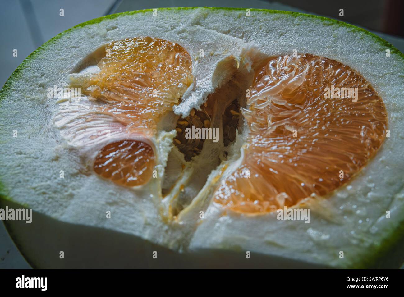 the seeds are visible inside this fresh Citrus fruit Stock Photo - Alamy