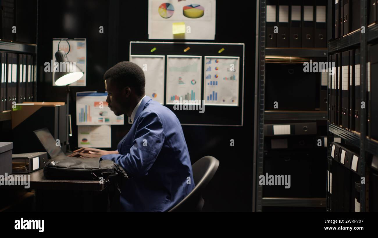 Private detective holding laptop bag entering office and begins working ...